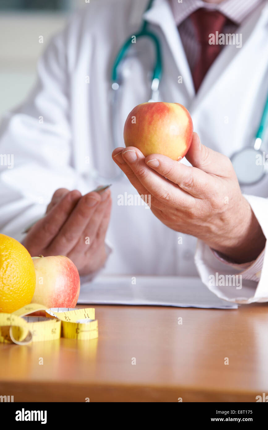 Doctor Giving Advice On Healthy Diet Stock Photo - Alamy