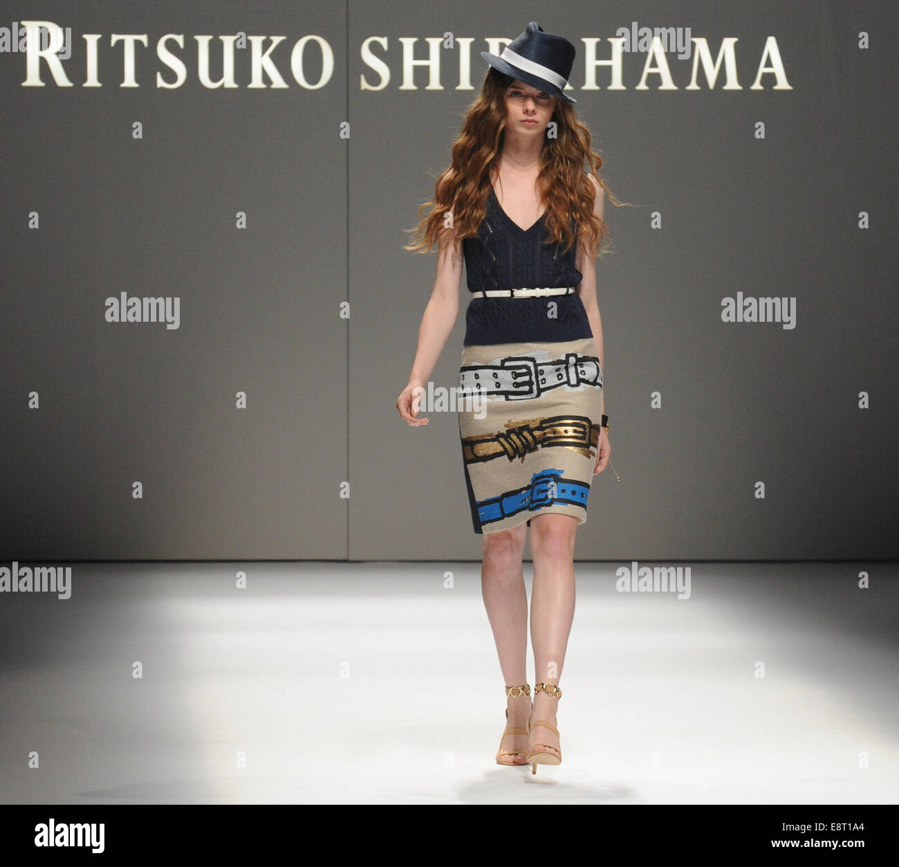 Tokyo, Japan. 14th Oct, 2014. A model displays a creation designed by ...