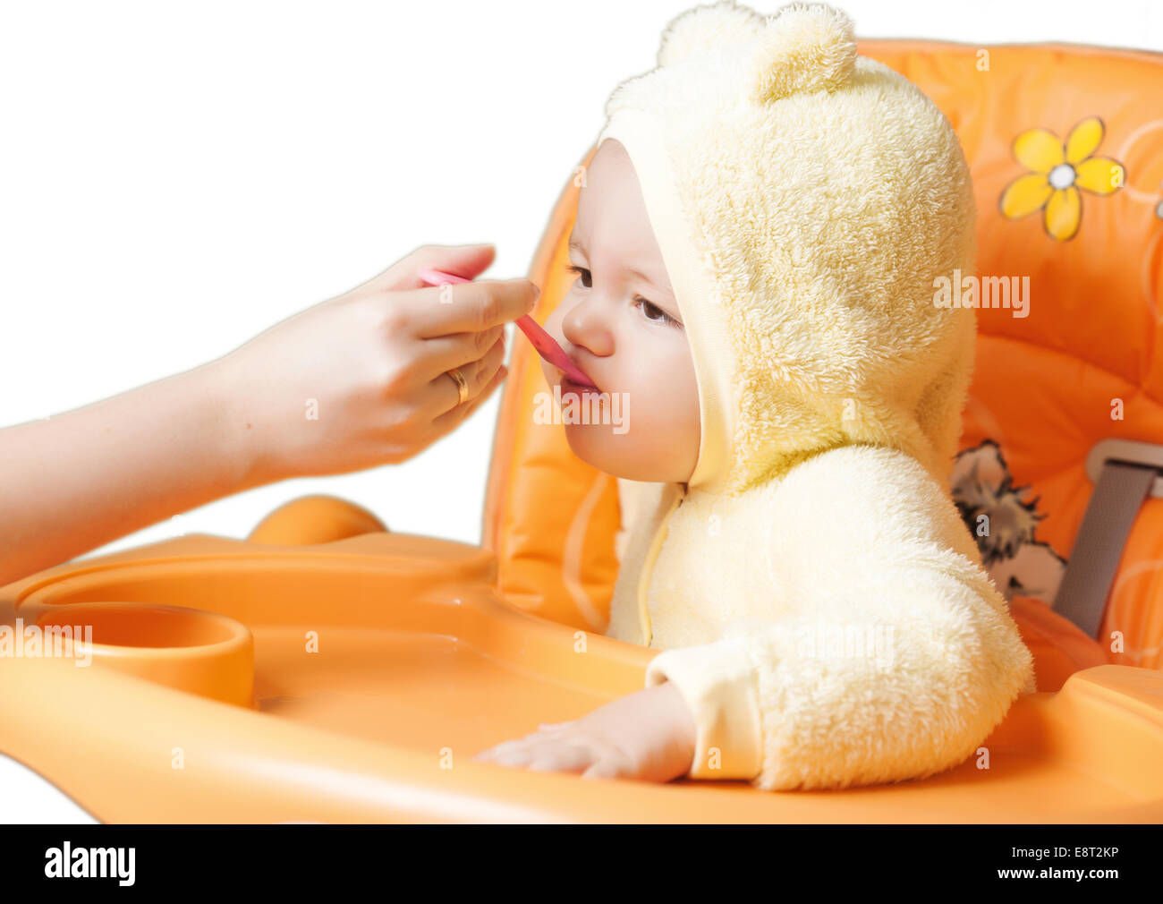 feeding cute baby boy isolated on white background Stock Photo - Alamy