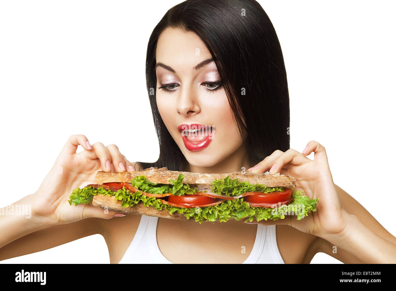 funny woman looking at long sandwich on white background Stock Photo ...