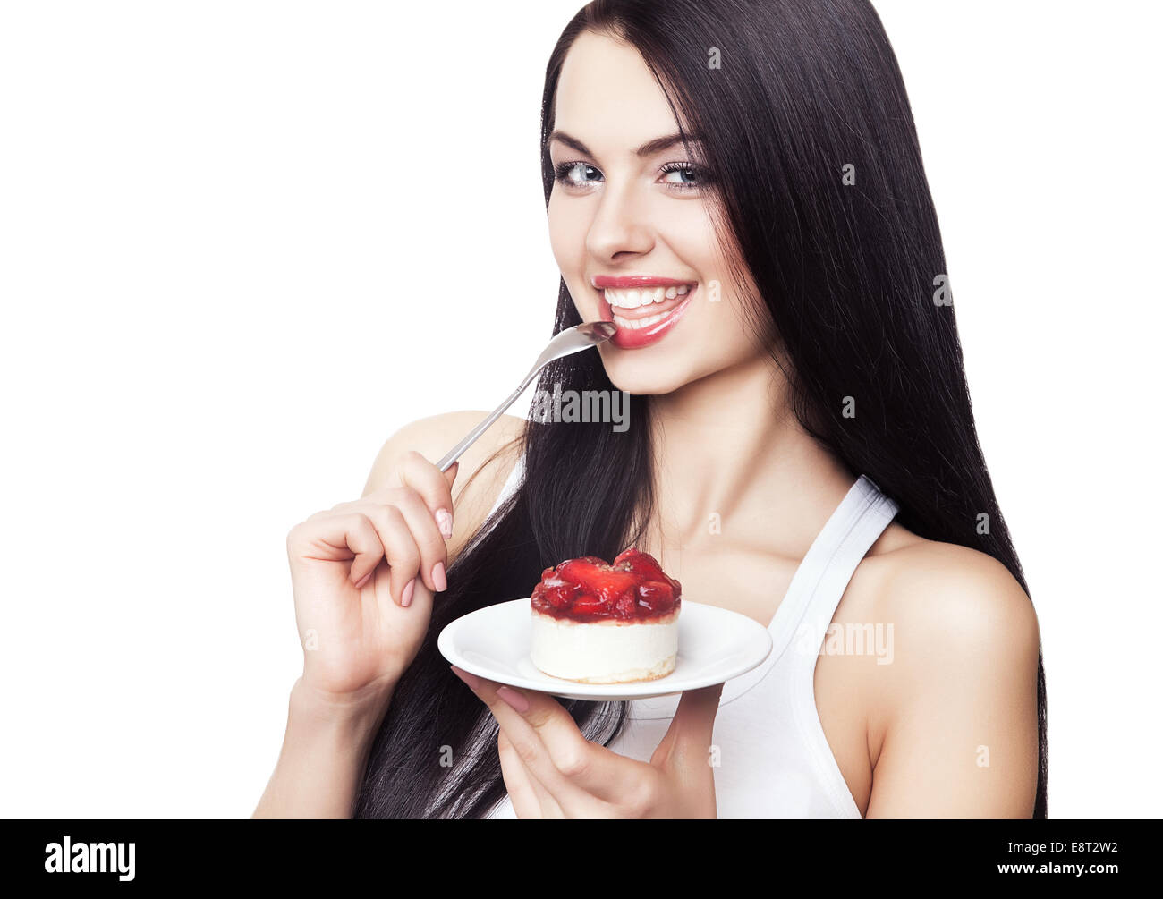 hungry happy girl with cake on white background Stock Photo - Alamy