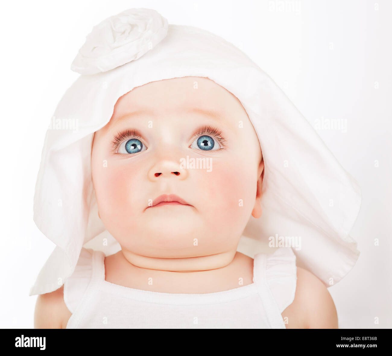 scared little child in white hat Stock Photo - Alamy