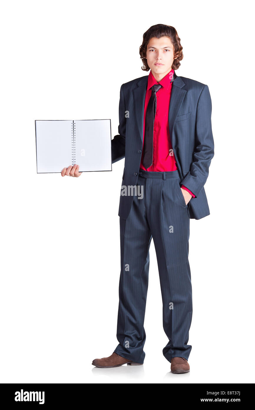 Serious student stands with notebook in gray suit and red shirt on ...