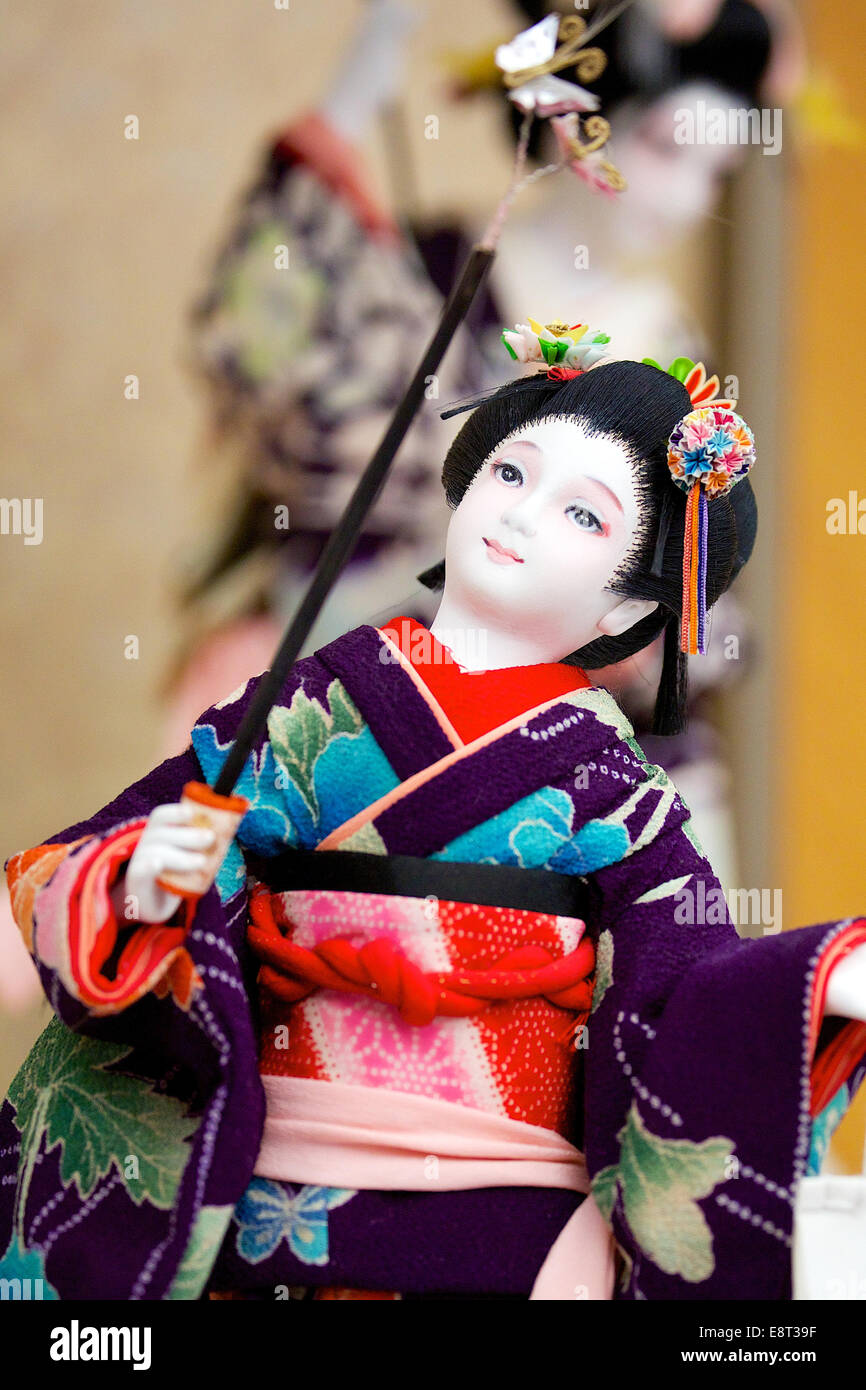 Japanese dolls dressed in traditional wear of the Edo era are displayed ...