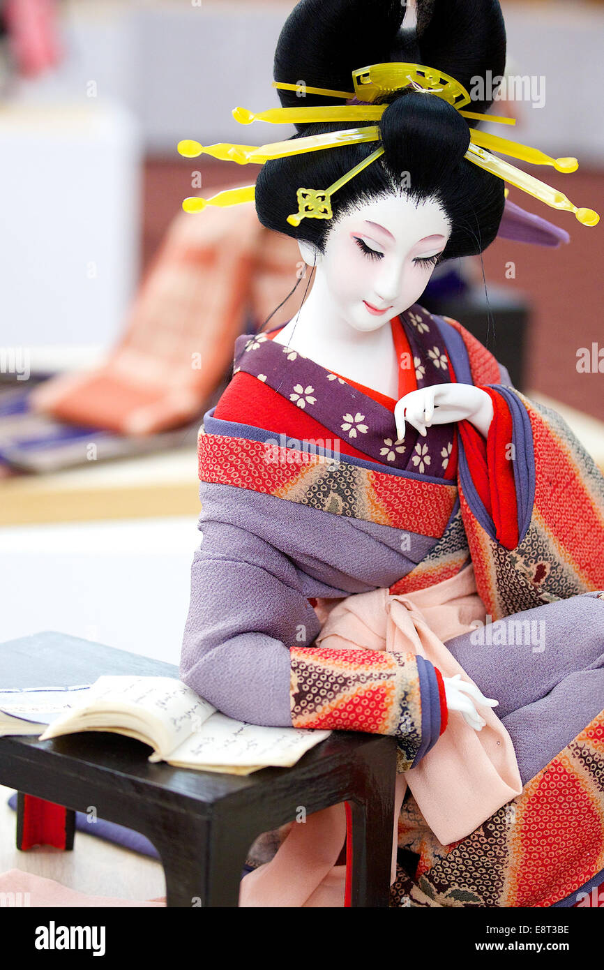 Japanese dolls dressed in traditional wear of the Edo era are displayed ...