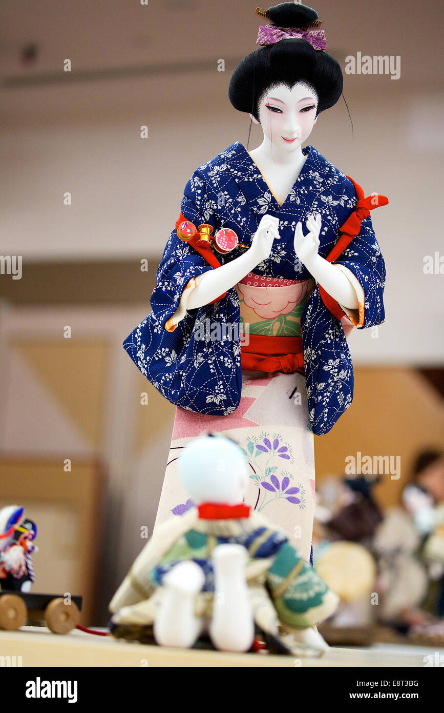 Japanese dolls dressed in traditional wear of the Edo era are displayed ...