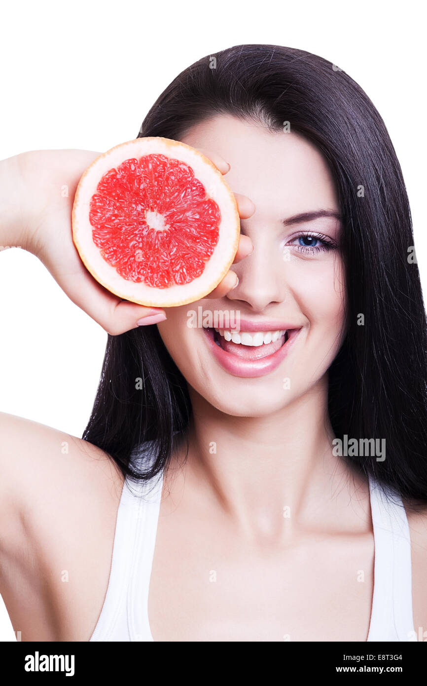 smiling girl with red grapefruit on white background Stock Photo - Alamy