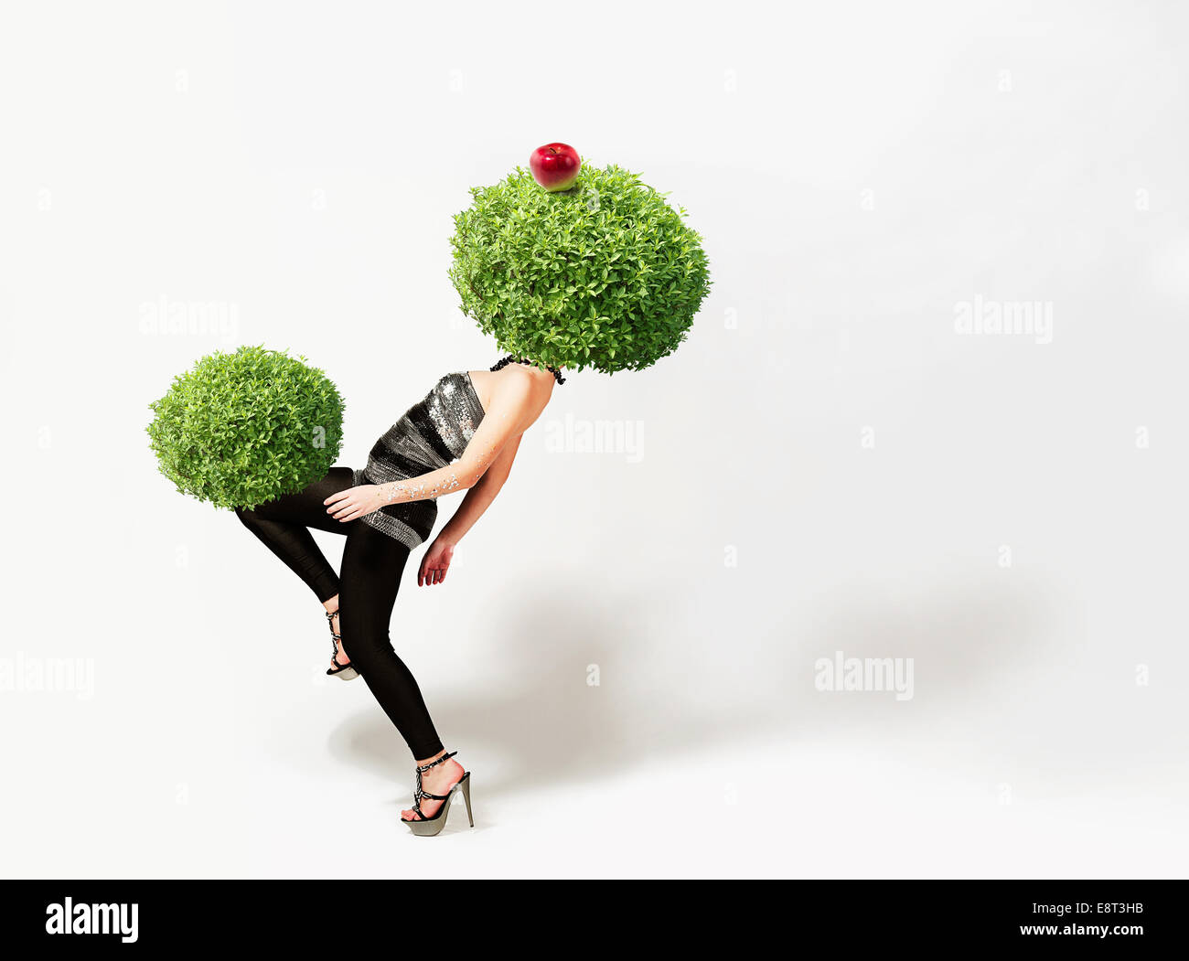 tree woman with red apple Stock Photo - Alamy