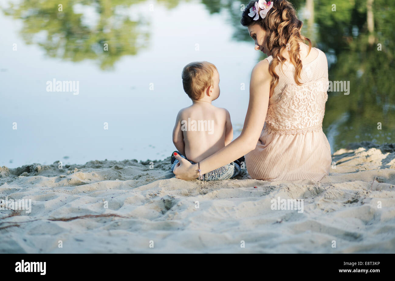Mom looking after her lovely baby Stock Photo - Alamy