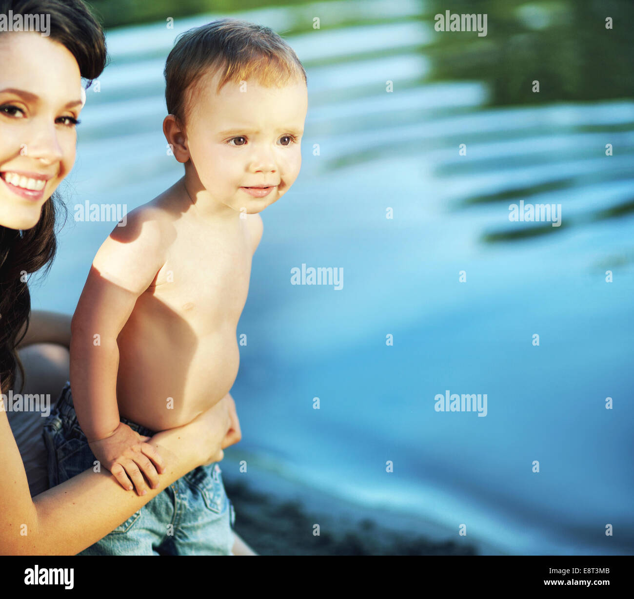 Mother posing with her cute little son Stock Photo - Alamy