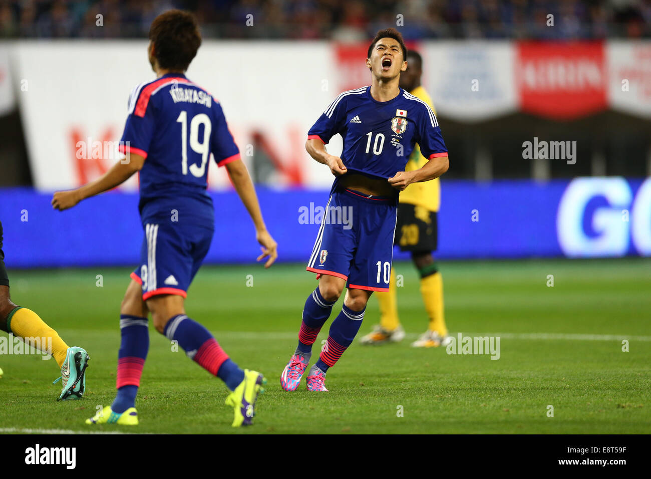 Niigata, Japan. 10th Oct, 2014. (R-L) Shinji Kagawa, Yu Kobayashi (JPN ...