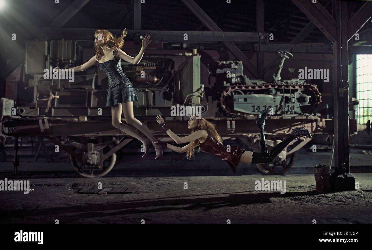 Art photo of the two flying ladies Stock Photo - Alamy