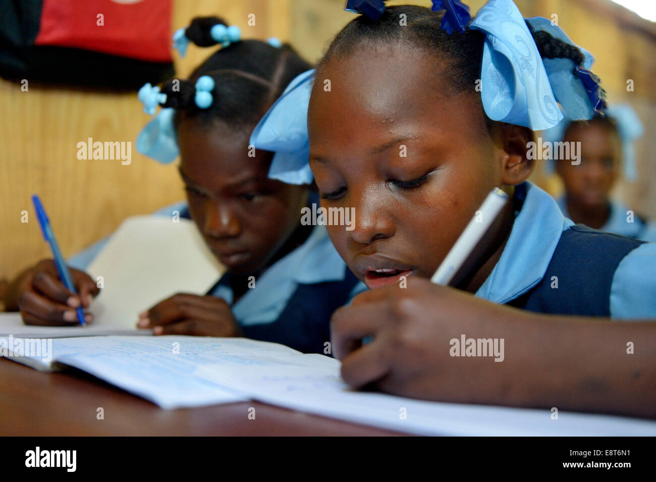 African school child in school writing hi-res stock photography and ...
