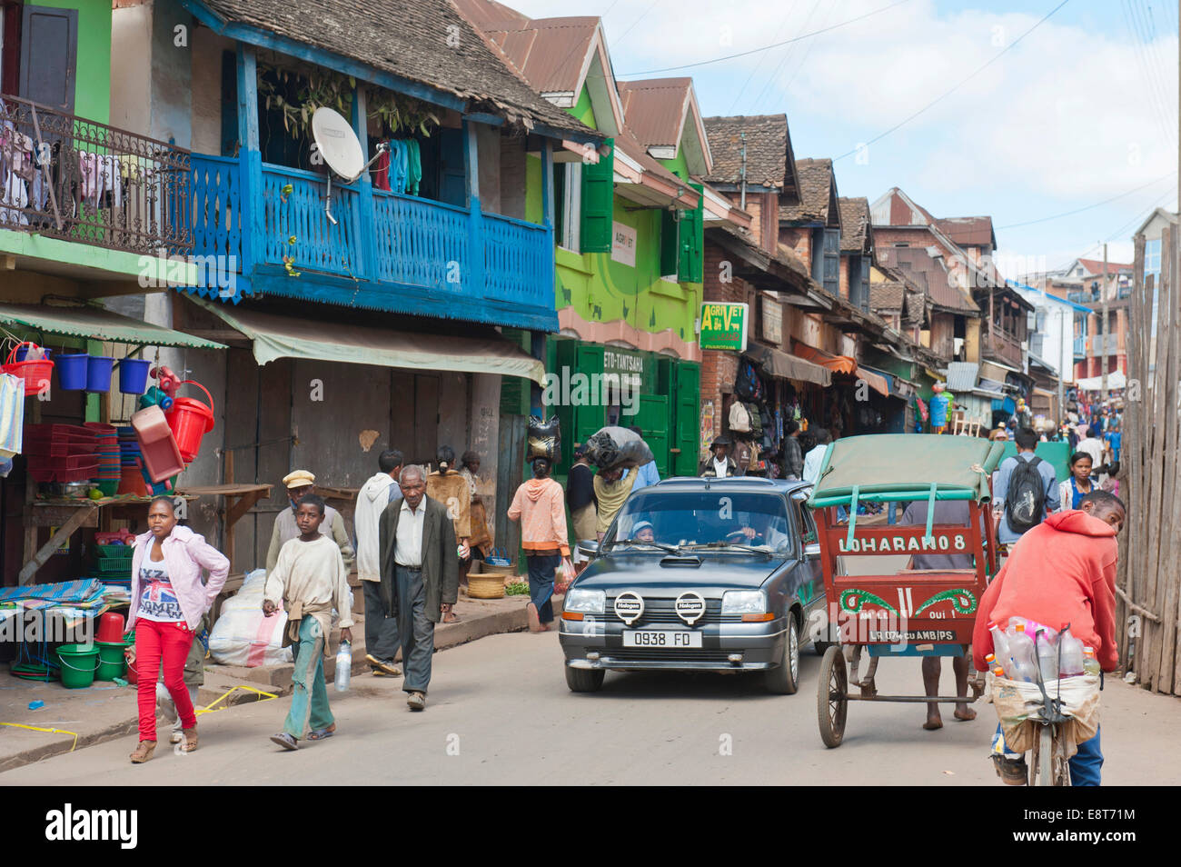 Market, Pousse Pousse, busy main road of Ambositra, Madagascar Stock ...
