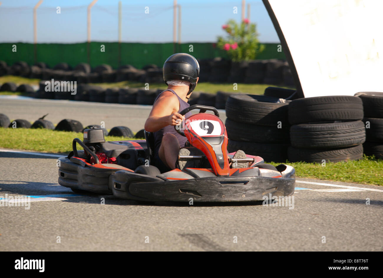 people having fun on a go cart Stock Photo - Alamy