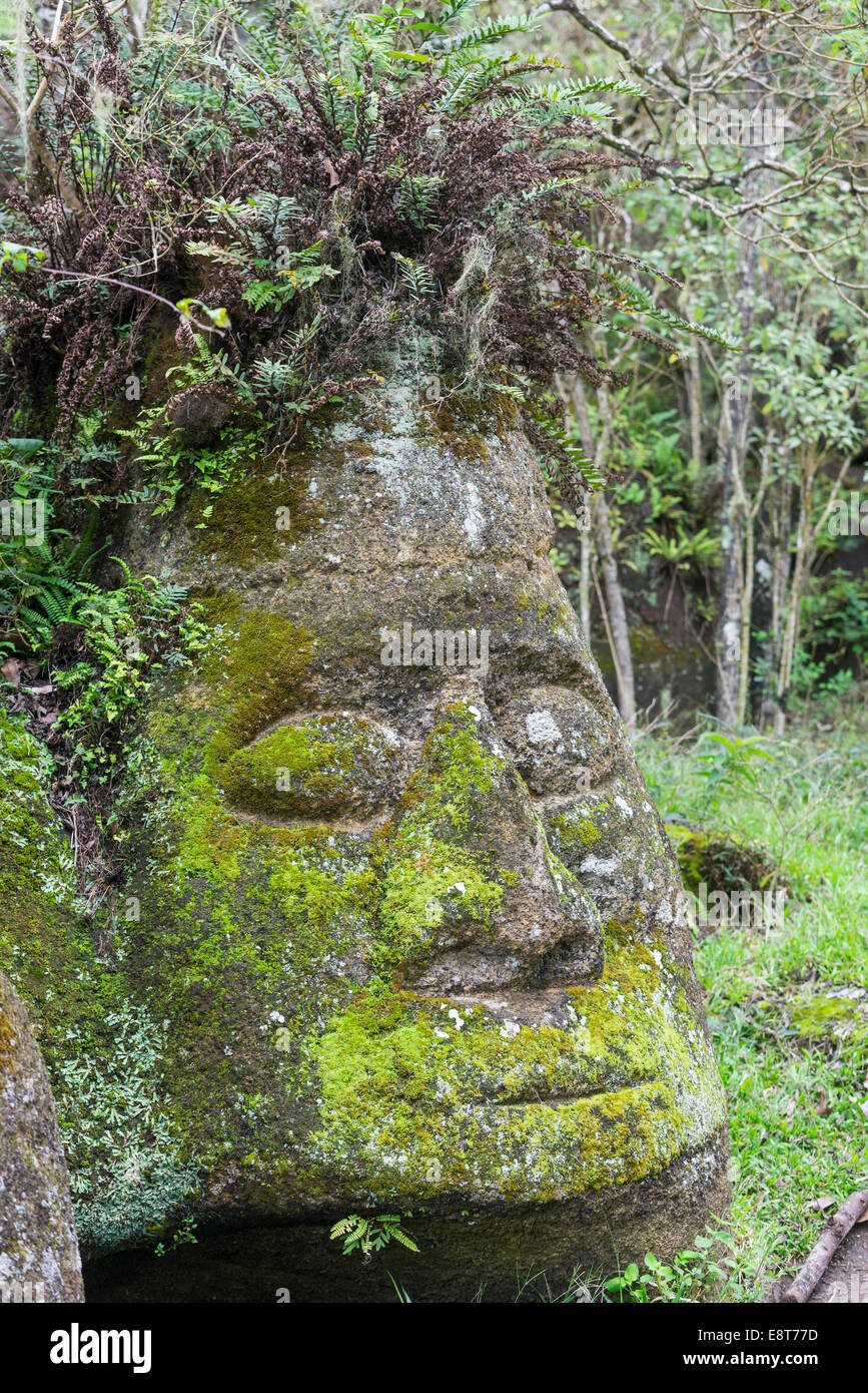 Sculpture of a face, hewn tuff rock, Isla Santa Maria or Floreana ...