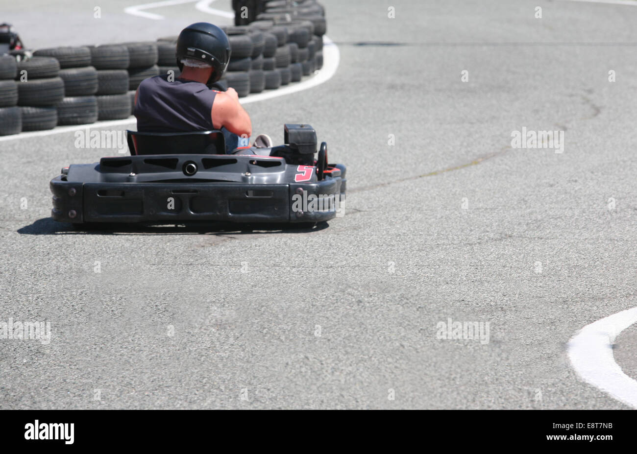 people having fun on a go cart Stock Photo - Alamy