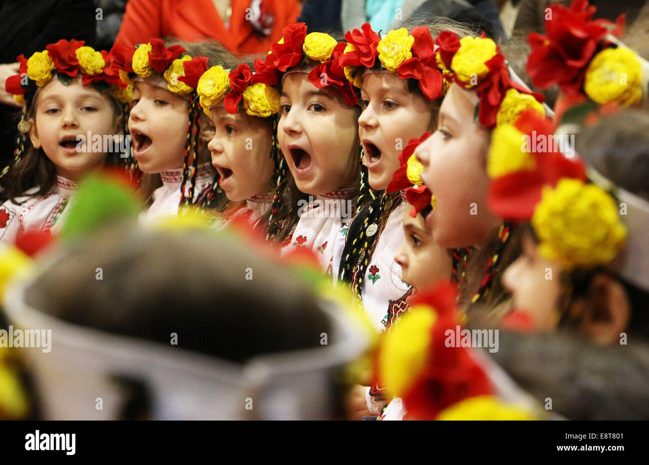 Bulgarian girls decorated by flowers attend the celebration of St ...