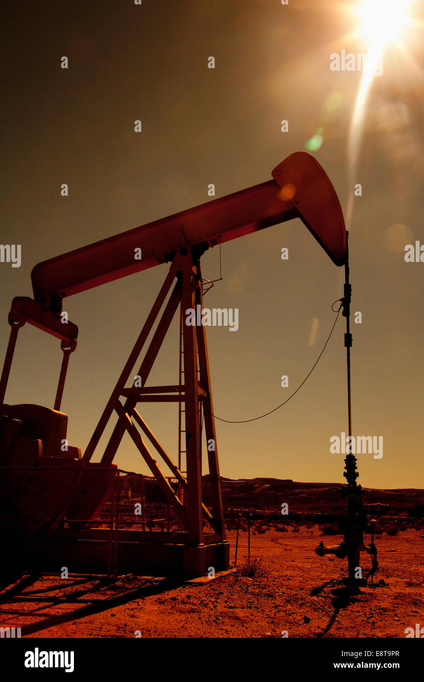 Oil pump drilling in remote field Stock Photo - Alamy