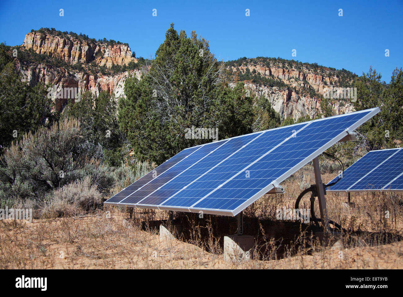 Solar panels in remote field near mountains, Zion National Park, Utah ...