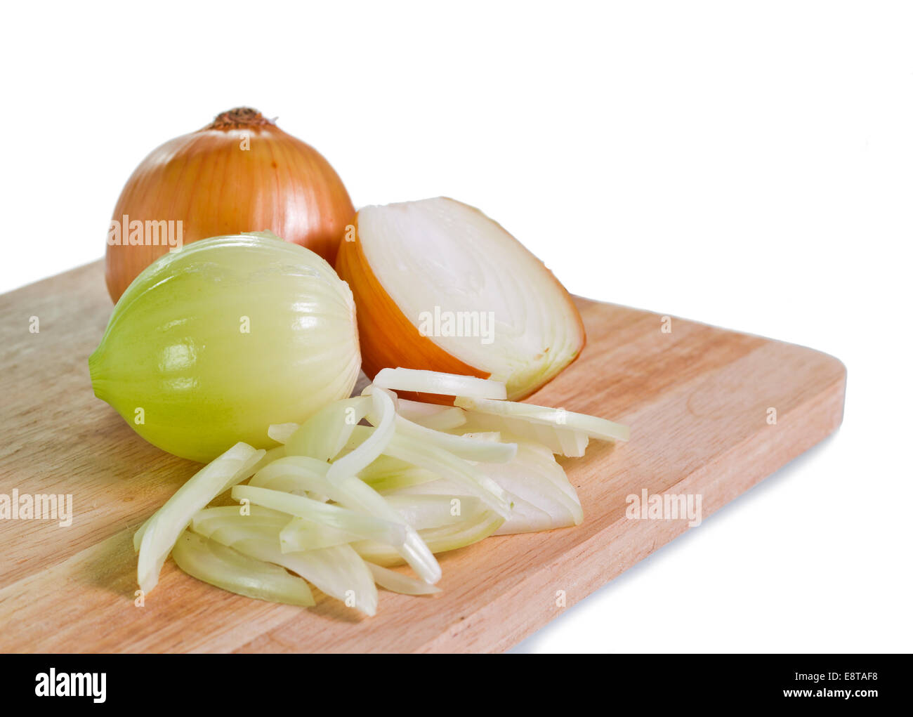 Bulb Onions on wooden chopping block and isolated white background ...