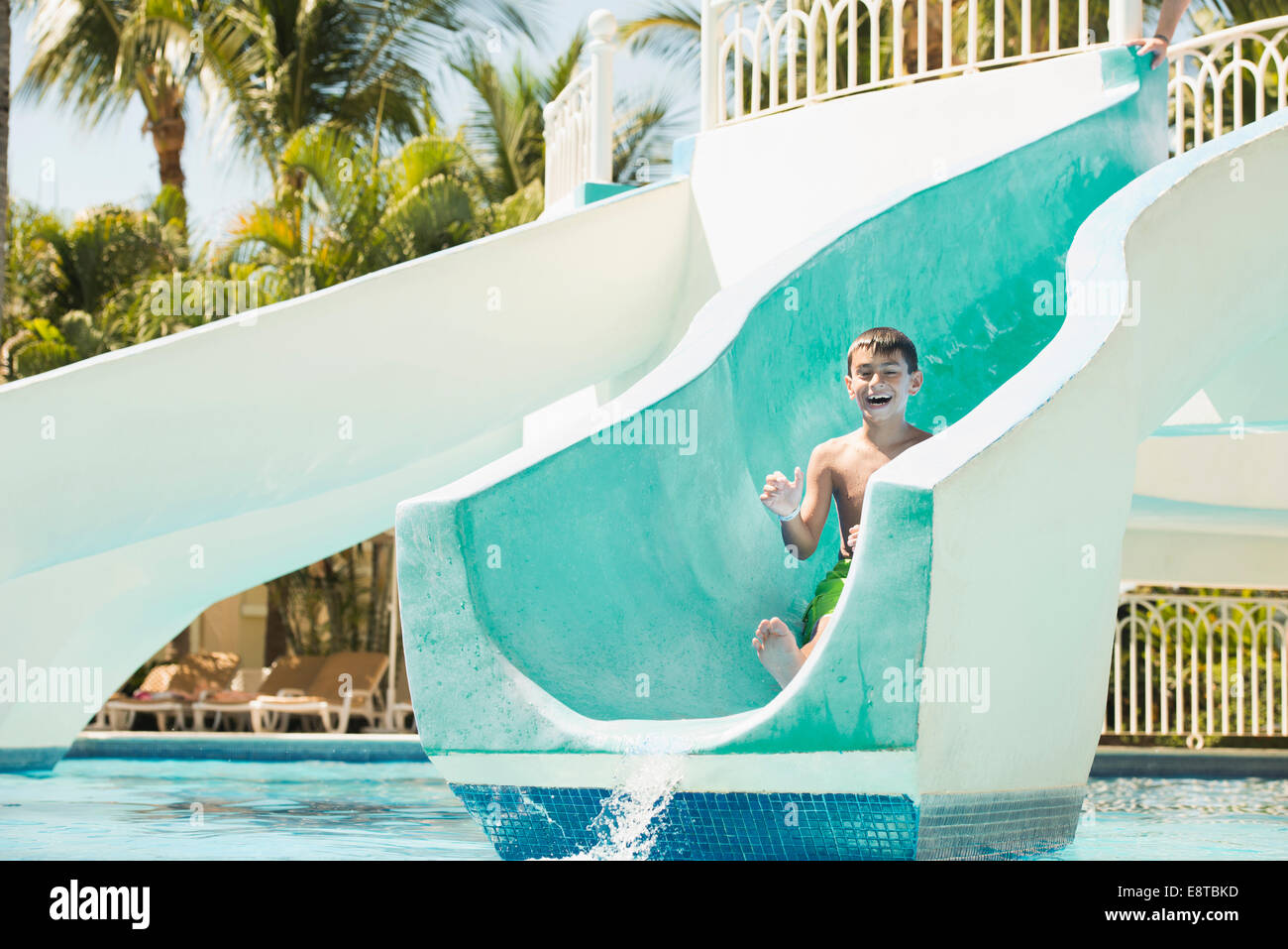 Boys water slide hi-res stock photography and images - Alamy