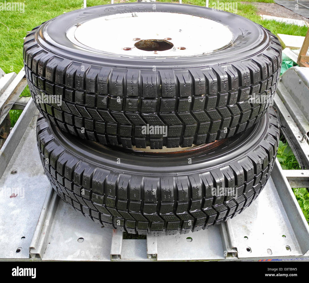 Used car tires for re-use second-hand for sale Stock Photo - Alamy