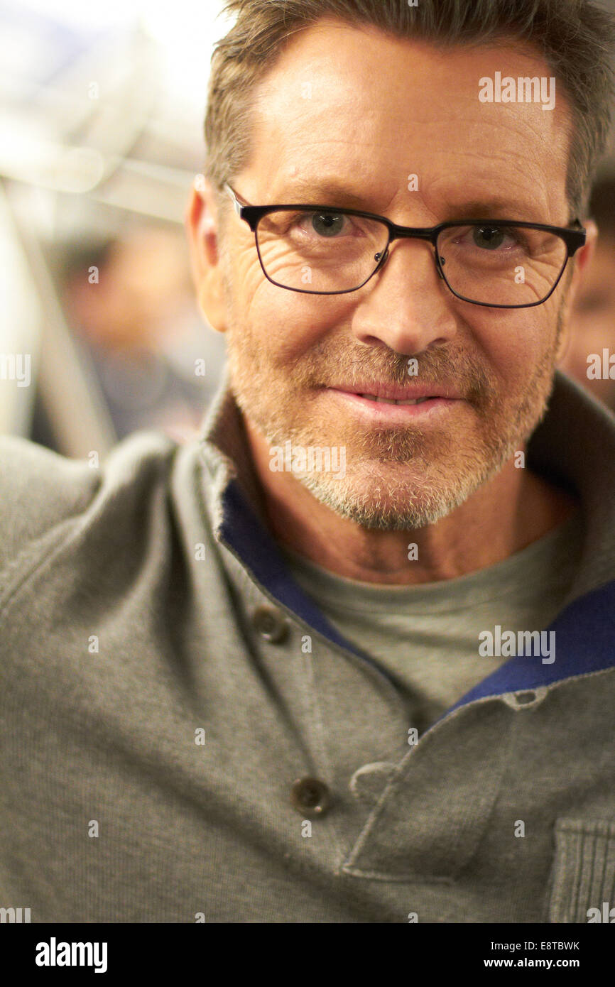 Smiling man beard eyeglasses hi-res stock photography and images - Alamy