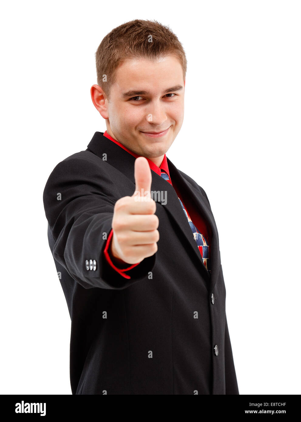Happy young man showing thumb up with one hand Stock Photo - Alamy