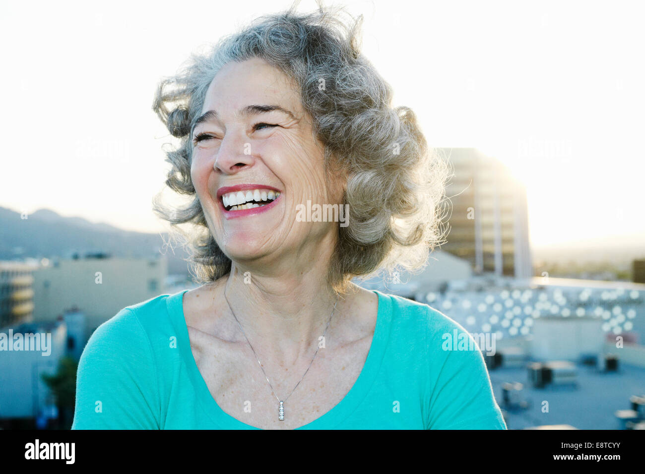 Rooftop woman hi-res stock photography and images - Alamy