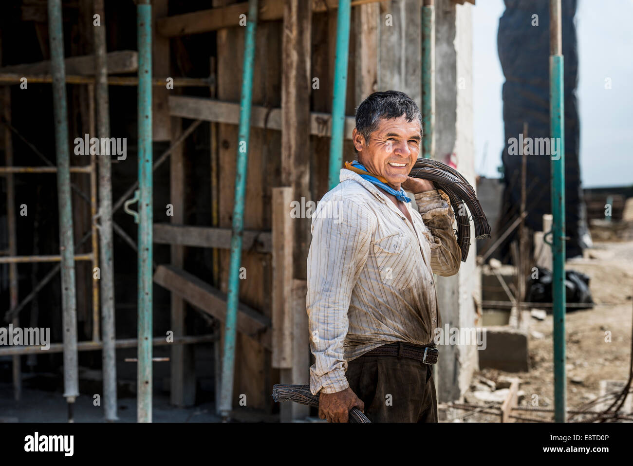 Hispanic construction worker at construction site Stock Photo - Alamy