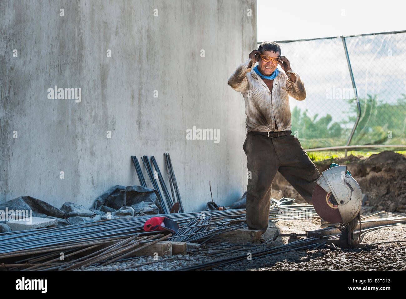 Hispanic construction worker at construction site Stock Photo - Alamy