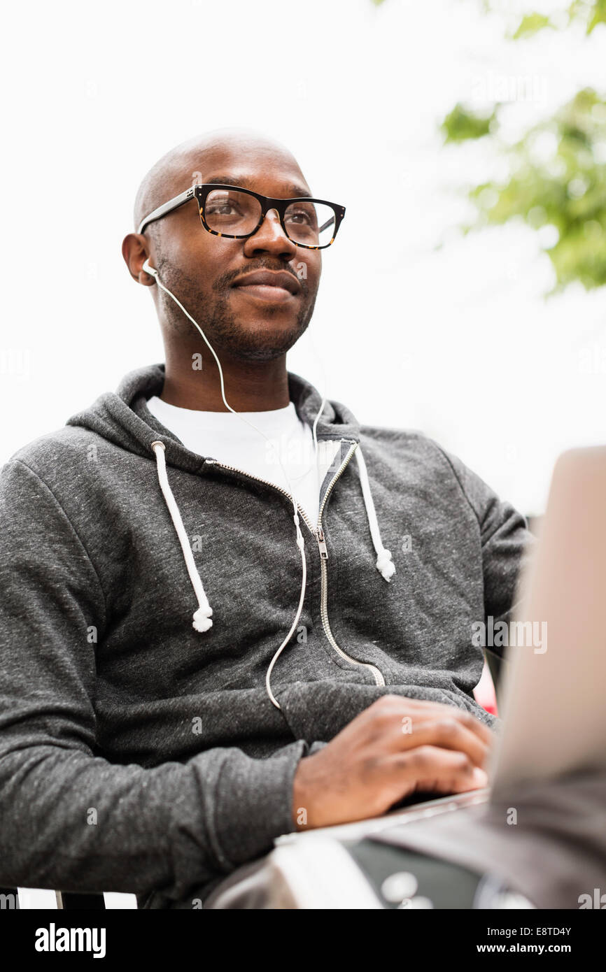 Back of man laptop hi-res stock photography and images - Alamy