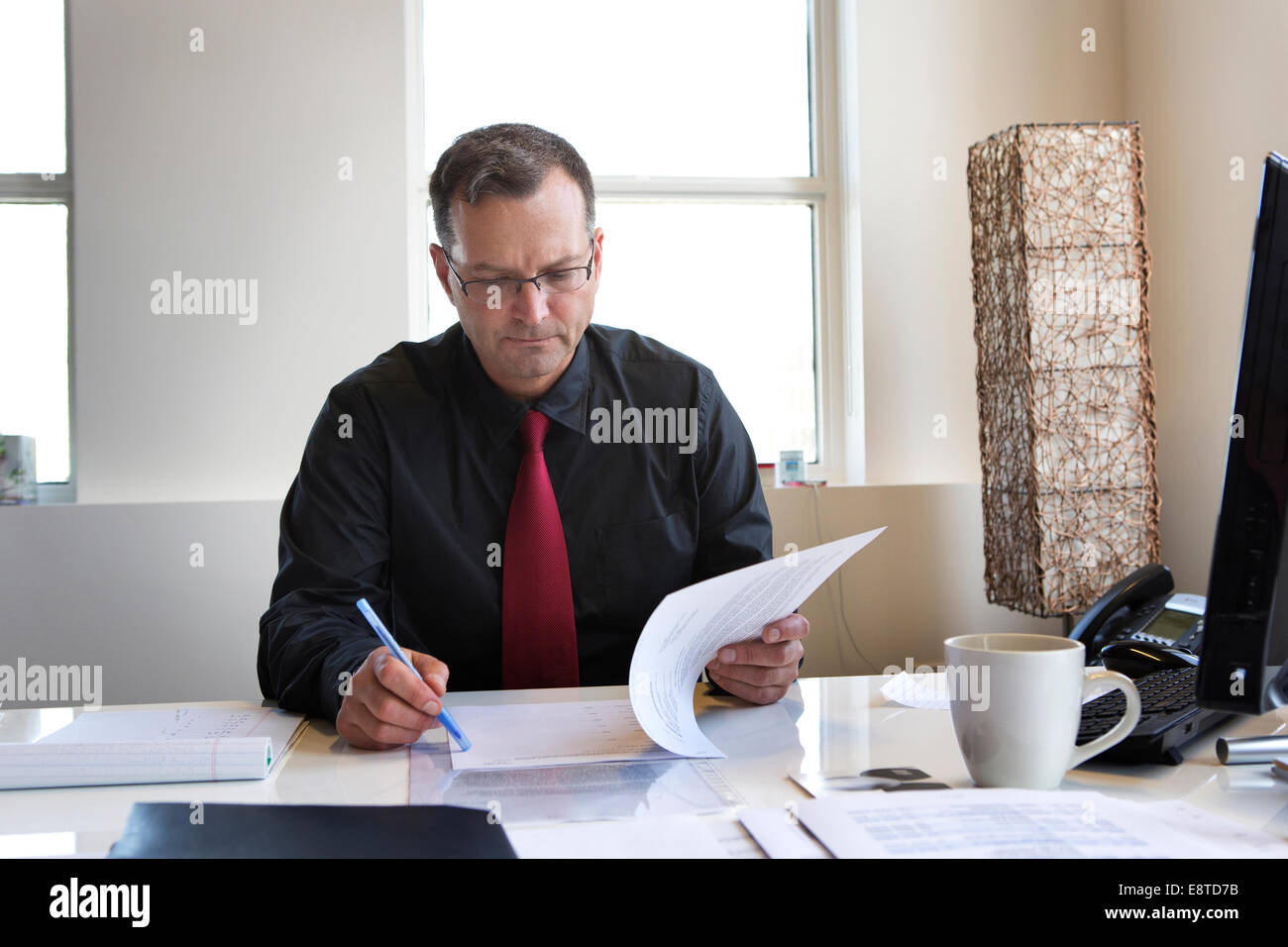 Mature businessman working desk hi-res stock photography and images - Alamy