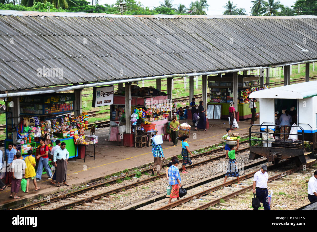 Burmese people waiting train and selling product at railway station in ...