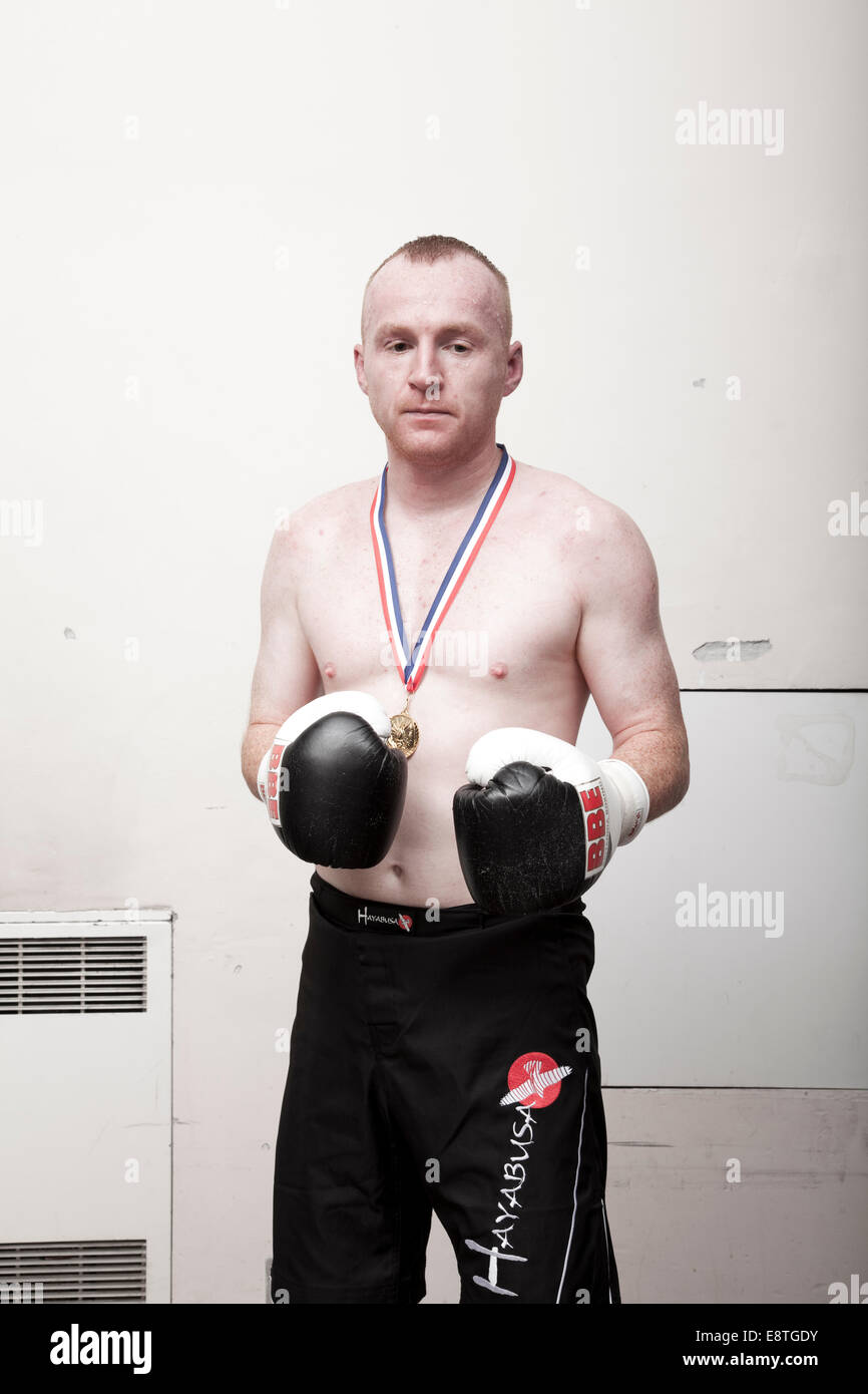 Boxers after a kickboxing boxing match, back stage, looking all tired ...
