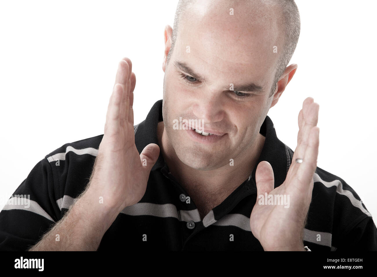 Bald normal man, describing something and talking on a white background ...