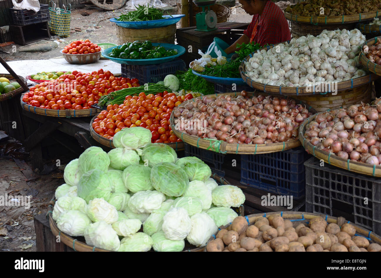 Burmese Woman selling fruit and vegetable in Bago market Myanmar Stock ...