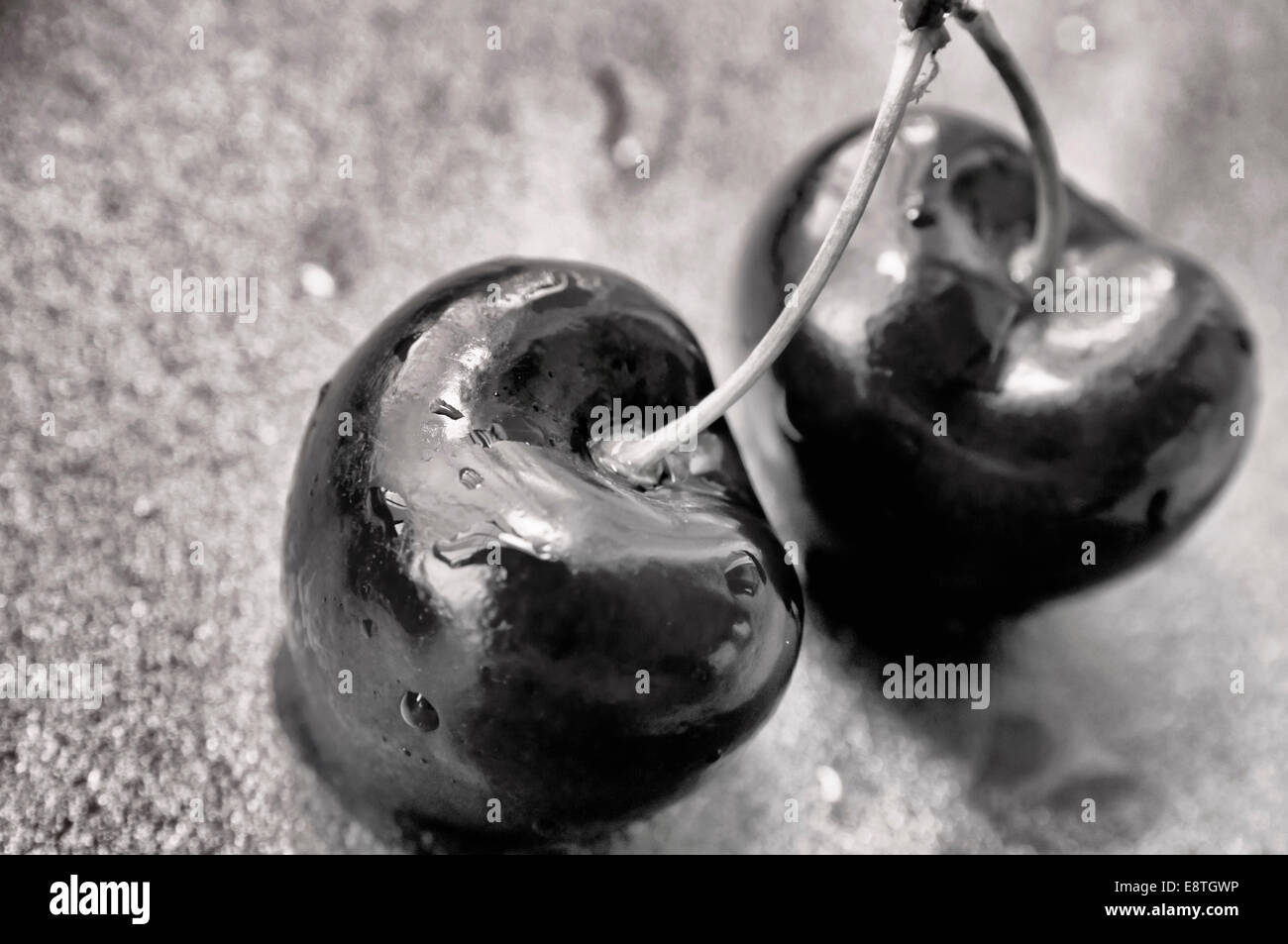 Two cherries with a strong black and white Stock Photo - Alamy