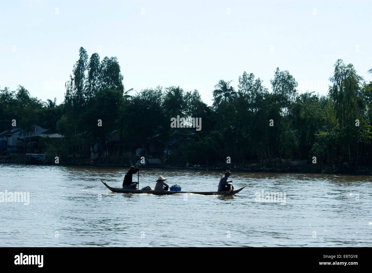 local people floating down a river in south east asia Stock Photo - Alamy
