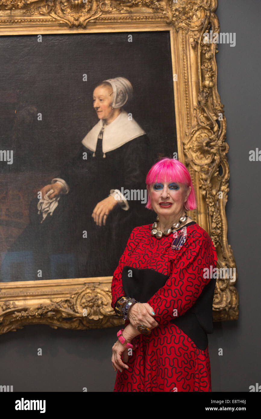 Dame Zandra Rhodes poses in front of the portrait of Catrina Hooghsaet ...