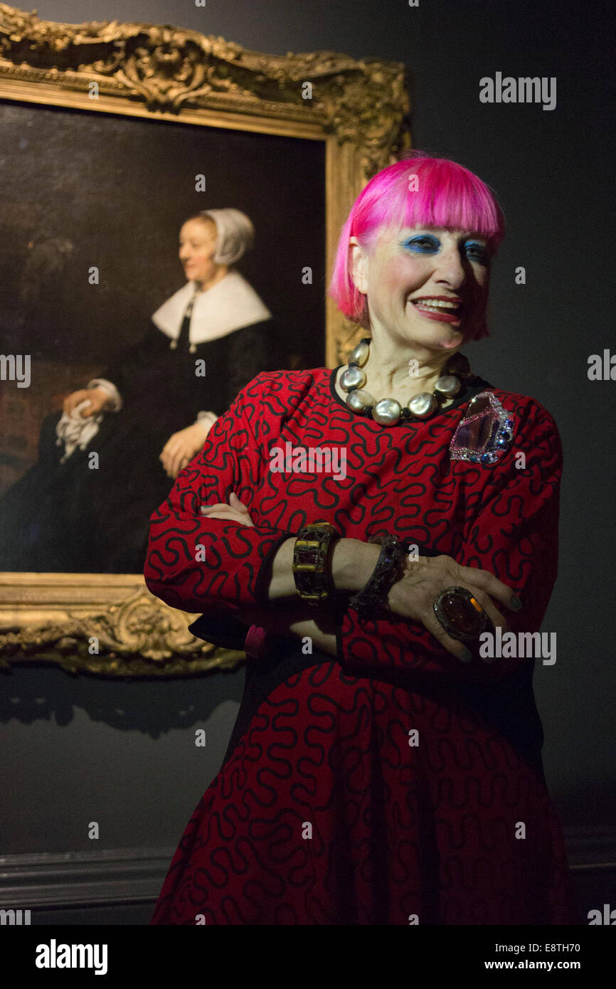 Dame Zandra Rhodes poses in front of the portrait of Catrina Hooghsaet ...