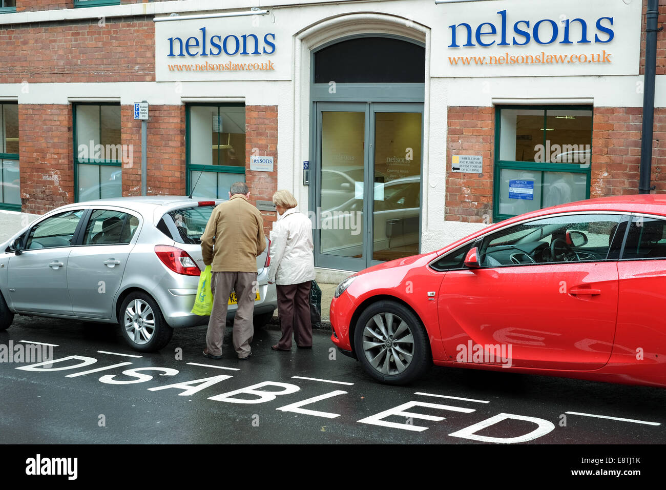 Disabled car parking bay painted hi-res stock photography and images ...