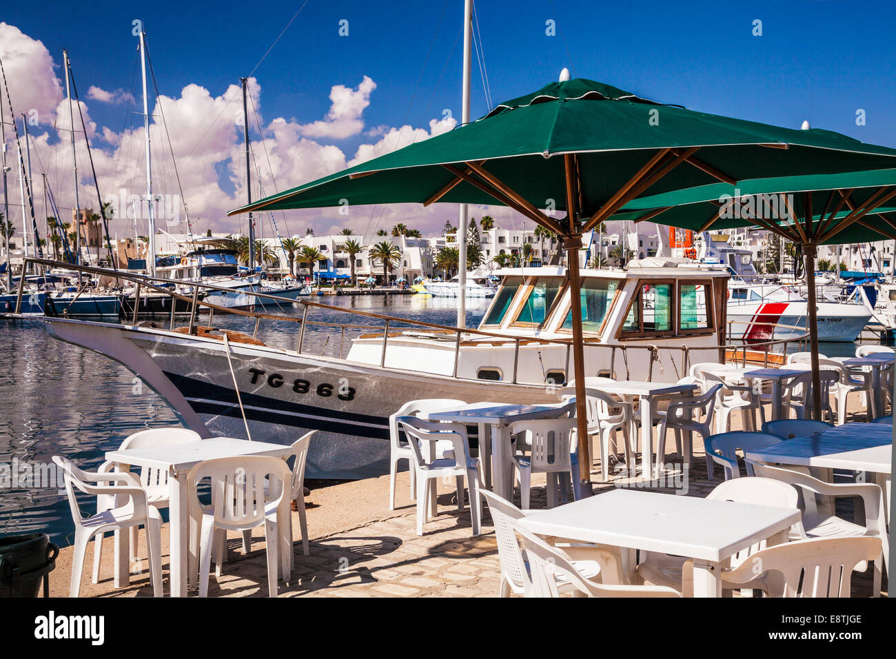 A harbourside cafe at the marina in Port el Kantoui in Tunisia Stock ...