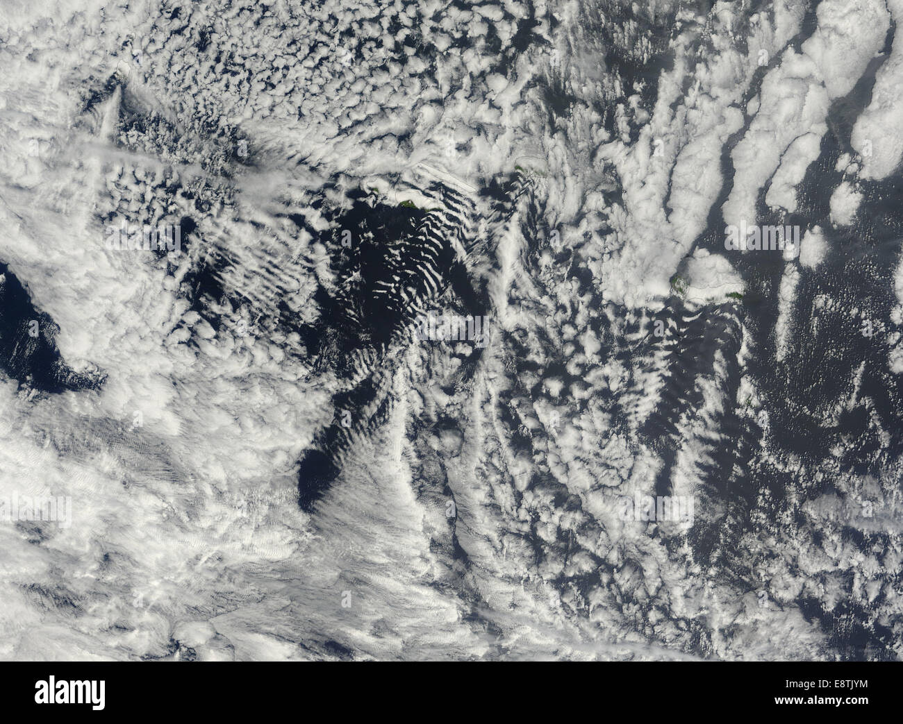Ship-wave-shape wave clouds are formed by the interaction of ships with ...