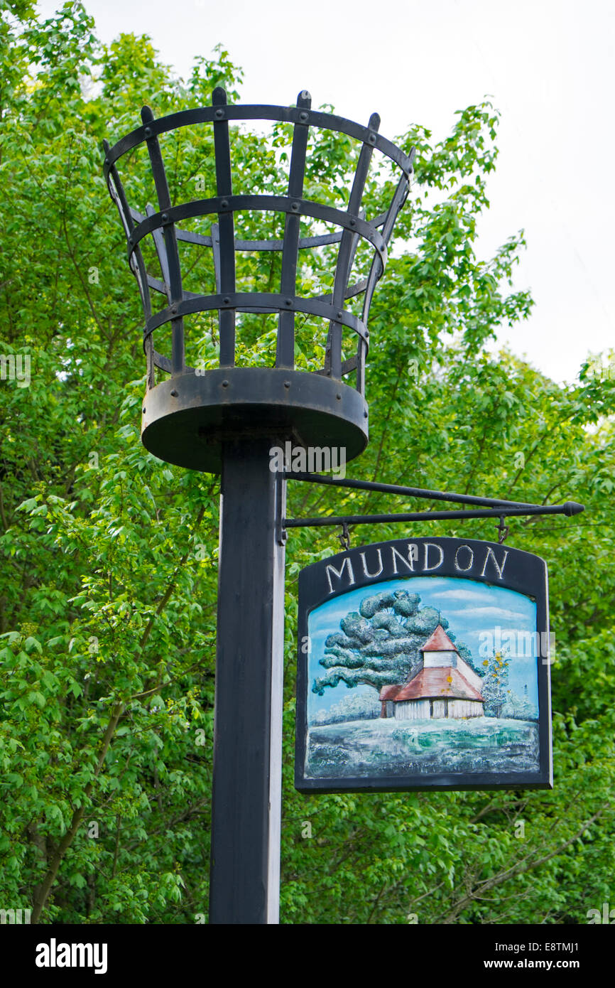 Mundon village sign and signal fire basket Stock Photo - Alamy