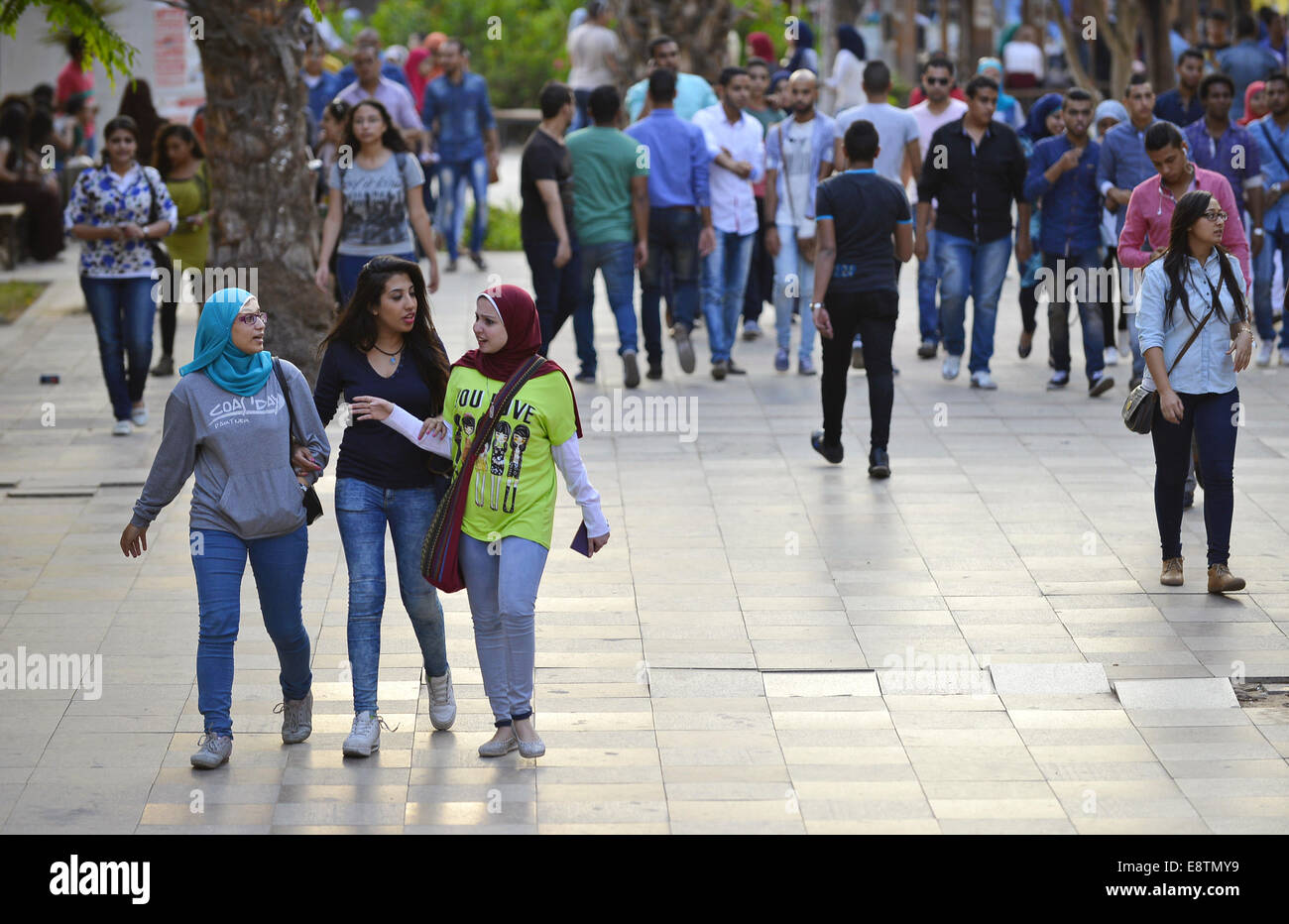 Cairo, Egypt. 14th Oct, 2014. Egyptian students walk at the Cairo ...