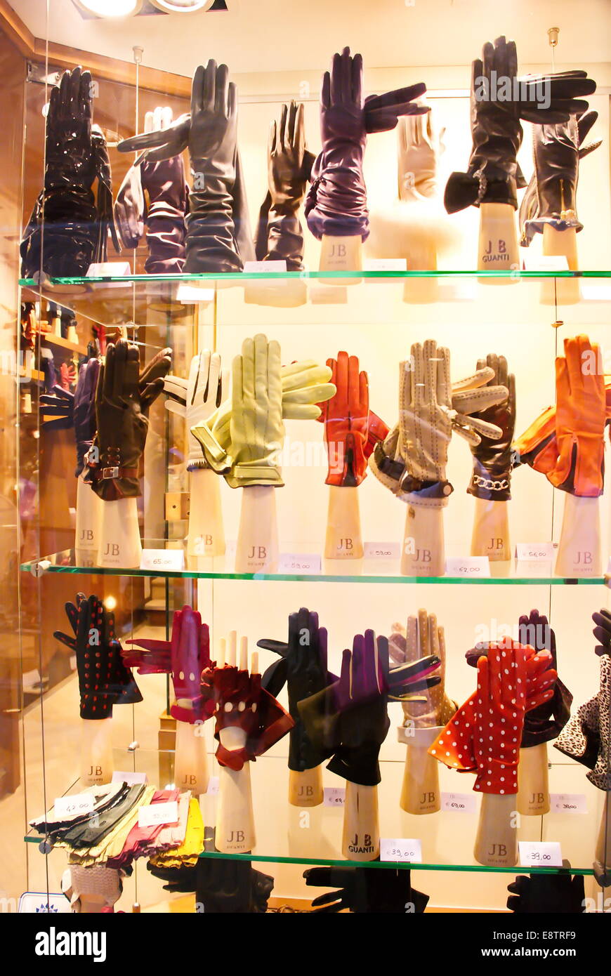 Colorful Italian gloves displayed in Venice store front window Stock ...