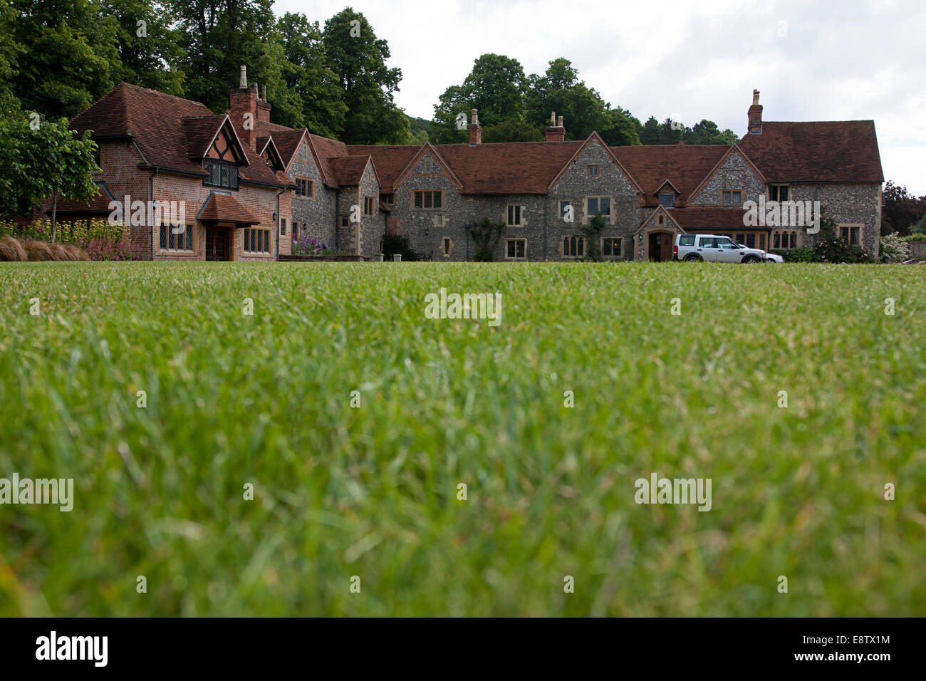 View across an immaculate lawn to the historic 11th Century Elevendon ...