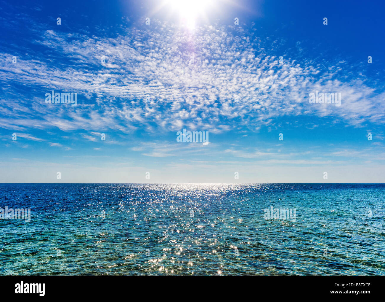 perfect sky and sun, water of ocean Stock Photo - Alamy